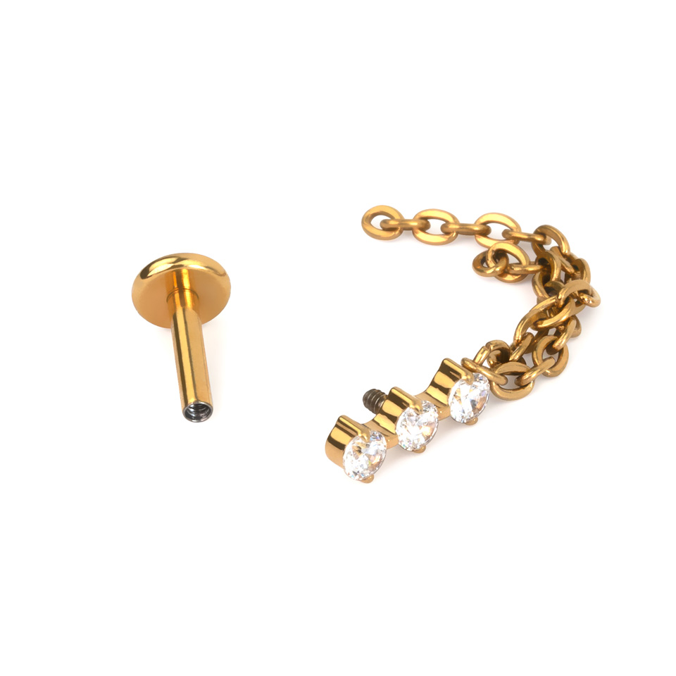 Joli labret avec trois pierres et deux chaînes pendantes